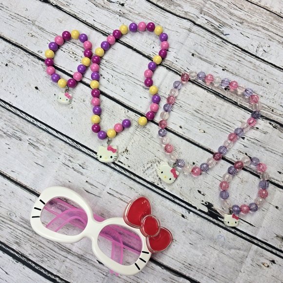 Hello Kitty | Accessories | Hello Kitty Pink And Purple Jewelry Set ...